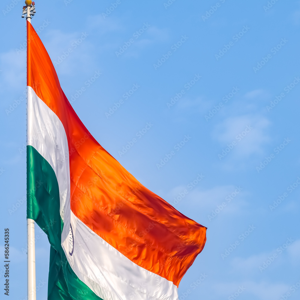 India flag flying high at Connaught Place with pride in blue sky, India ...