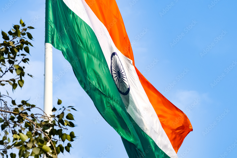 India flag flying high at Connaught Place with pride in blue sky, India ...