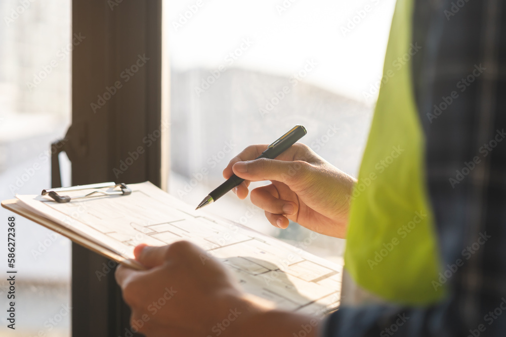 Building inspection, asian contractor young man, male inspecting home ...