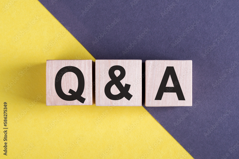 Wooden cube with vocabulary Q and A on gray and yellow background Stock ...