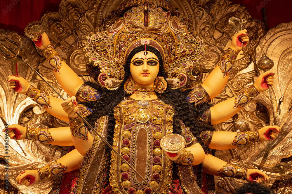 Idol of Goddess Devi Durga at a decorated puja pandal in Kolkata, West ...