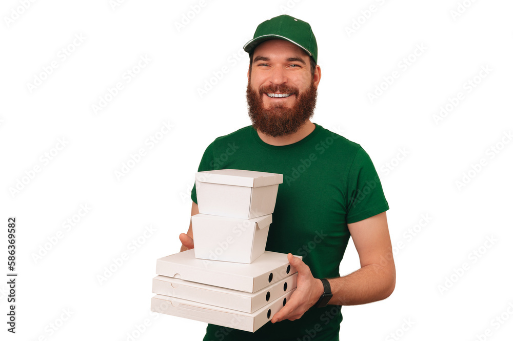Smiling delivery man wearing uniform is holding some lunch carton boxes ...