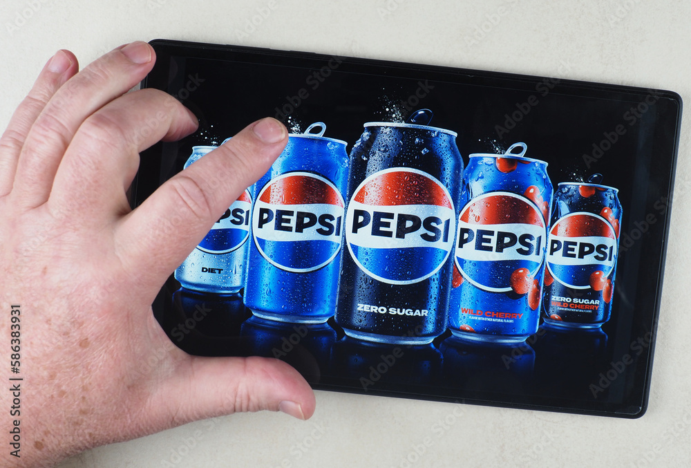 In this photo illustration, the new Pepsi logo on a smartphone and ...