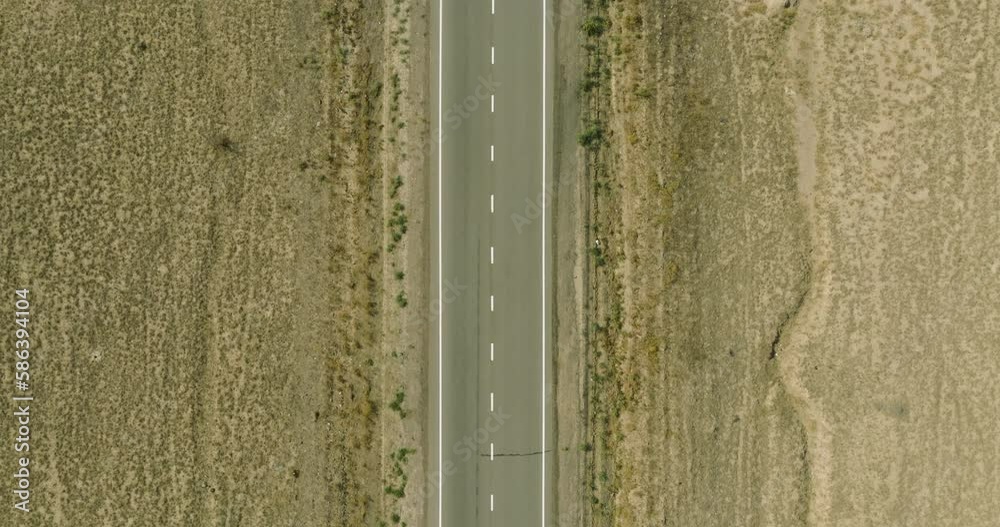 Two crossover SUV car driving alone, travel on empty straight asphalt ...