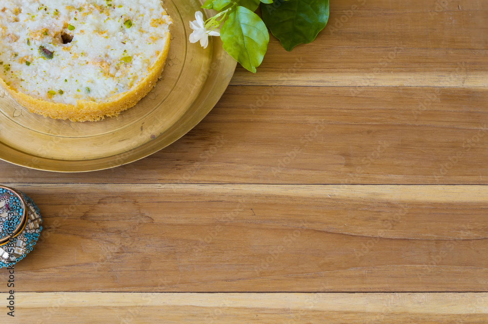 Ghewar or ghevar is a traditional sweet of rajasthan. It is made of ...