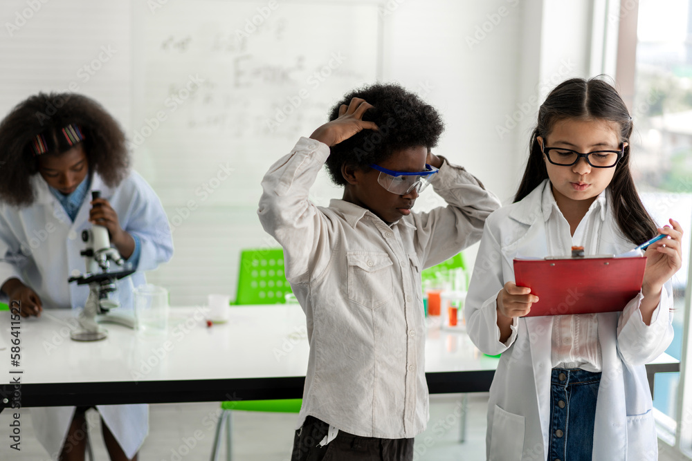 Group of teenage student learn science and study doing a chemical ...