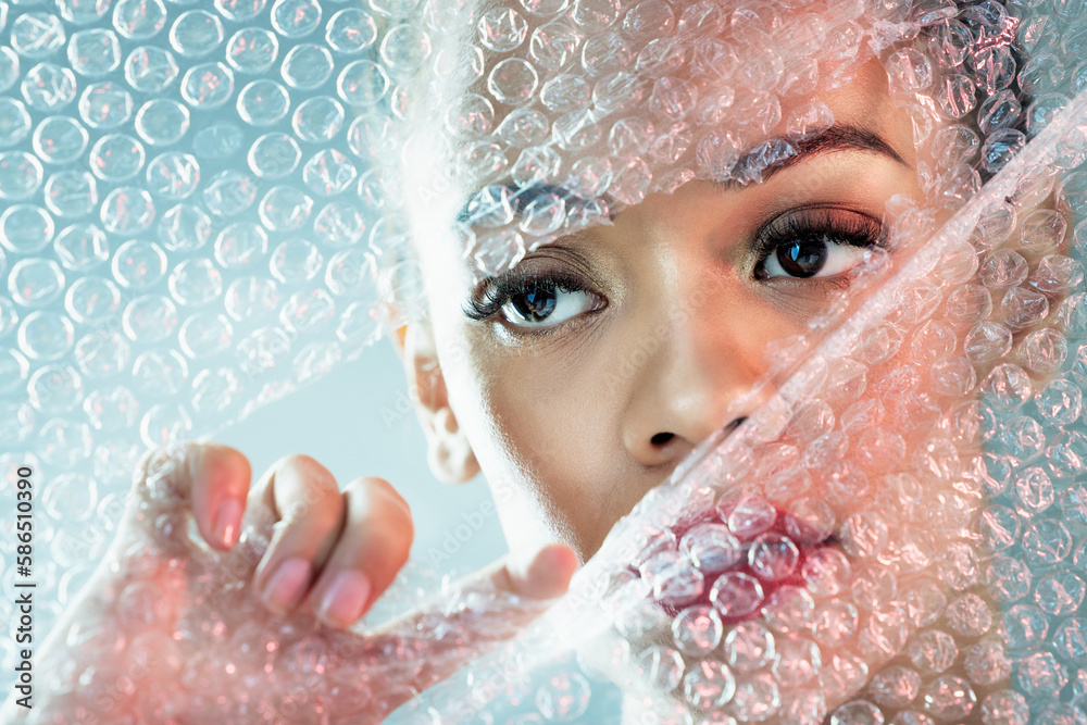 Bubble wrap, cosmetics and face of woman with makeup, red lipstick and ...
