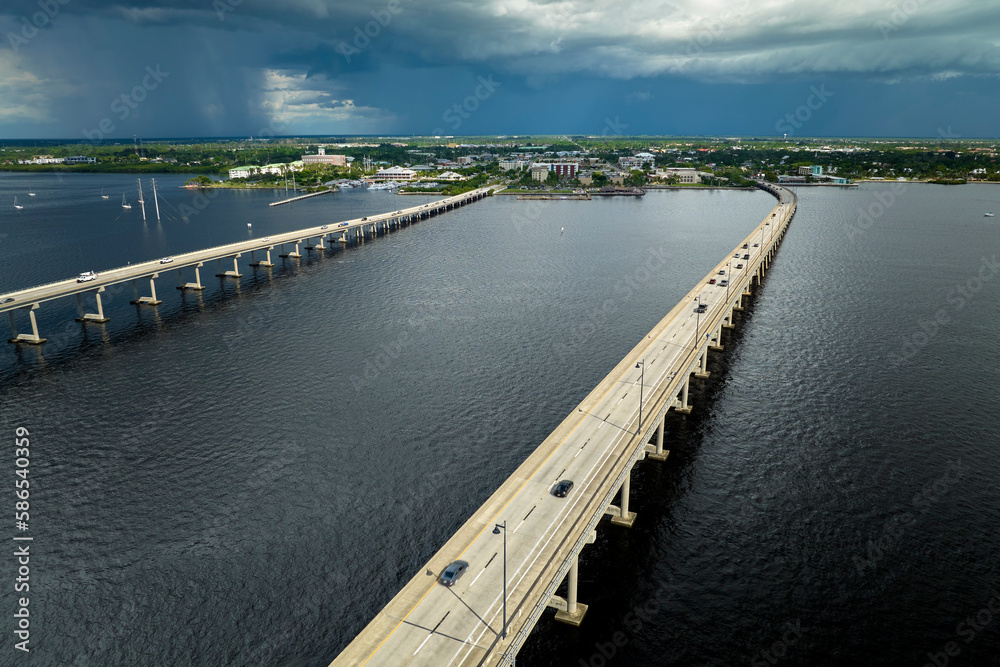 Barron Collier Bridge and Gilchrist Bridge in Florida with moving ...
