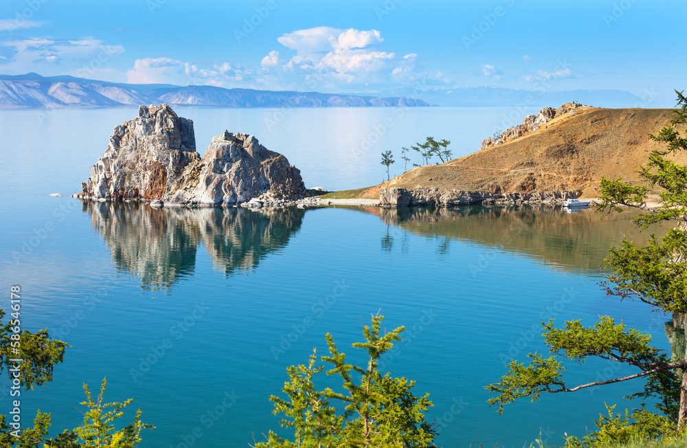 Scenic summer landscape of Baikal Lake. Tourists walk near famous ...
