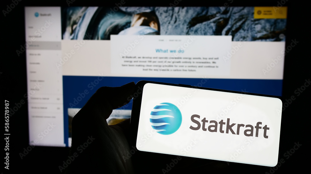 Stuttgart, Germany - 03-24-2023: Person holding mobile phone with logo ...