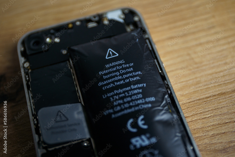 Iphone with exploded Lithium-ion battery. Li-ion swollen battery Stock ...