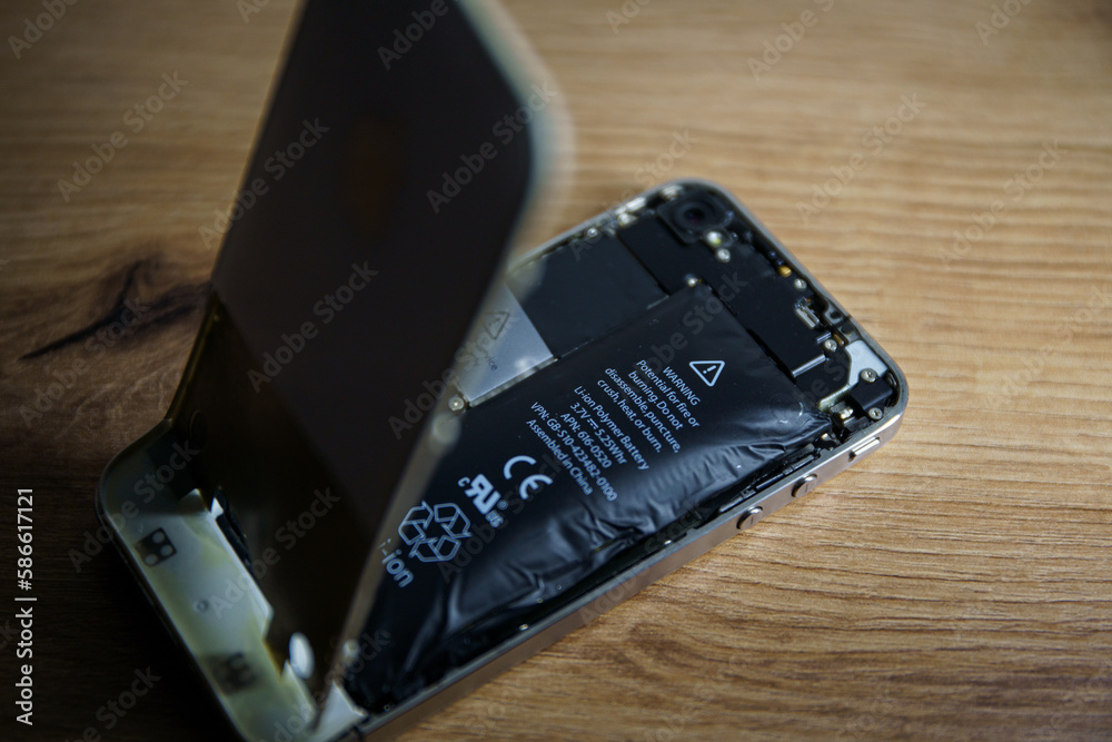 Iphone with exploded Lithium-ion battery. Li-ion swollen battery Stock ...