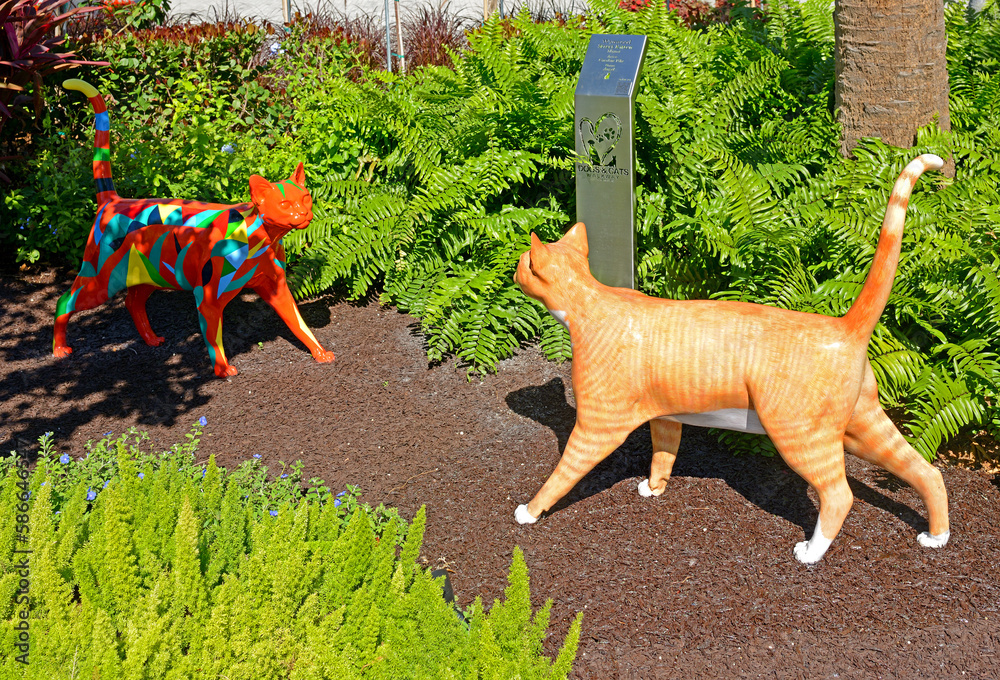 Meeting two cats. Dogs and Cats Walkway and Sculpture Gardens, path of ...