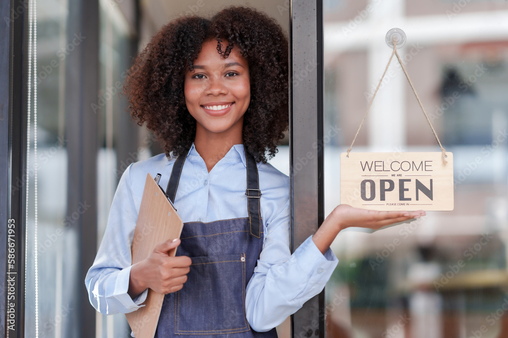 Foto de Female store owner or staff, food, cafe or bar, showing the ...
