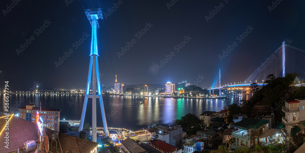 Colorful night view of Bai Chay Bridge, connecting two parts of Ha Long ...
