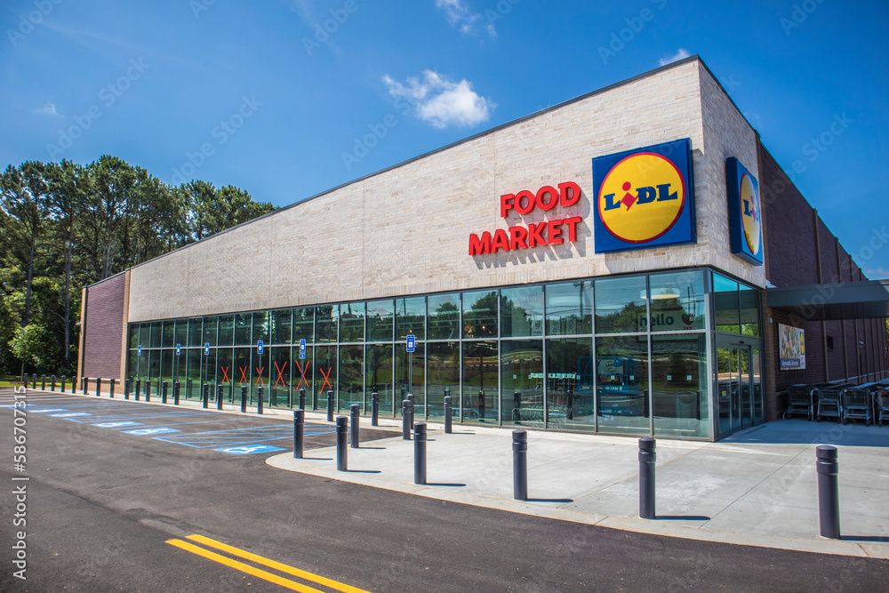Newly built LIDL view of the front corner of the building with sign and ...