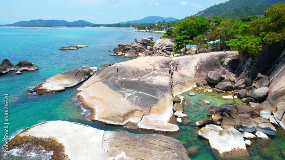 The drone captures the stunning Hin Ta Hin Yai rock formation in Koh ...