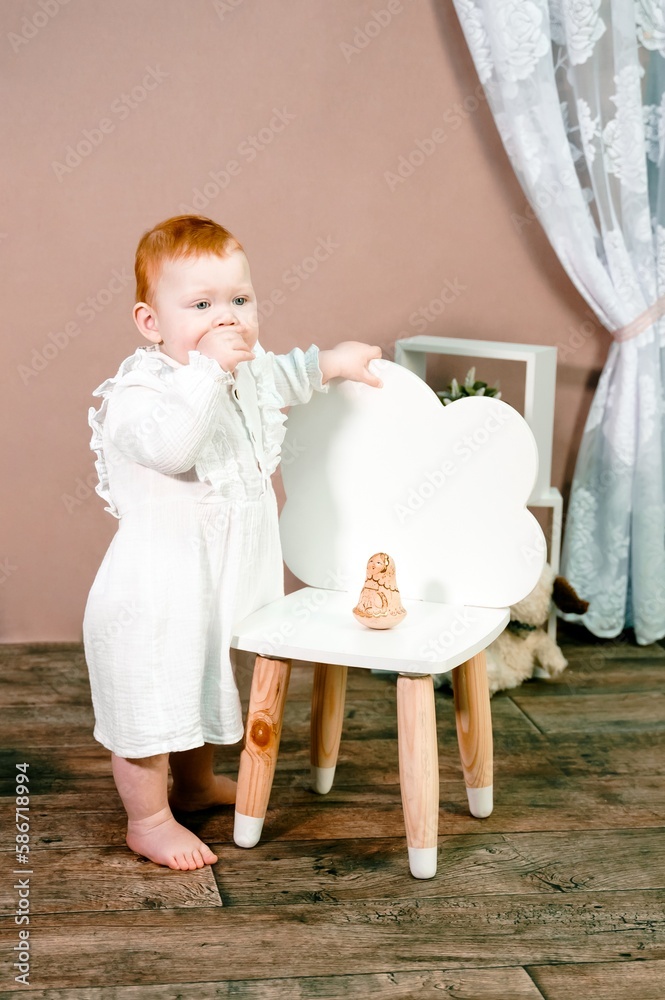 Fotografia do Stock: Little redhead baby girl celebrates first birthday ...