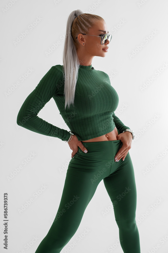 Sexy fitness woman. Beautiful athletic girl in green leggings Stock ...