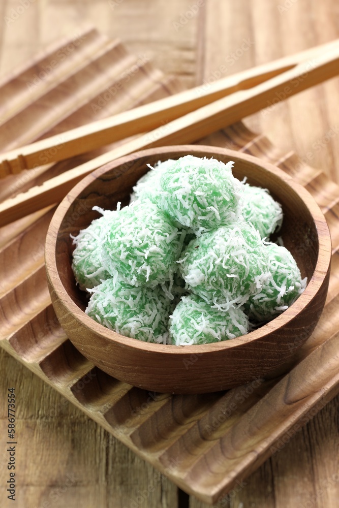 Klepon or kelepon, is a snack of sweet rice cake balls filled with ...