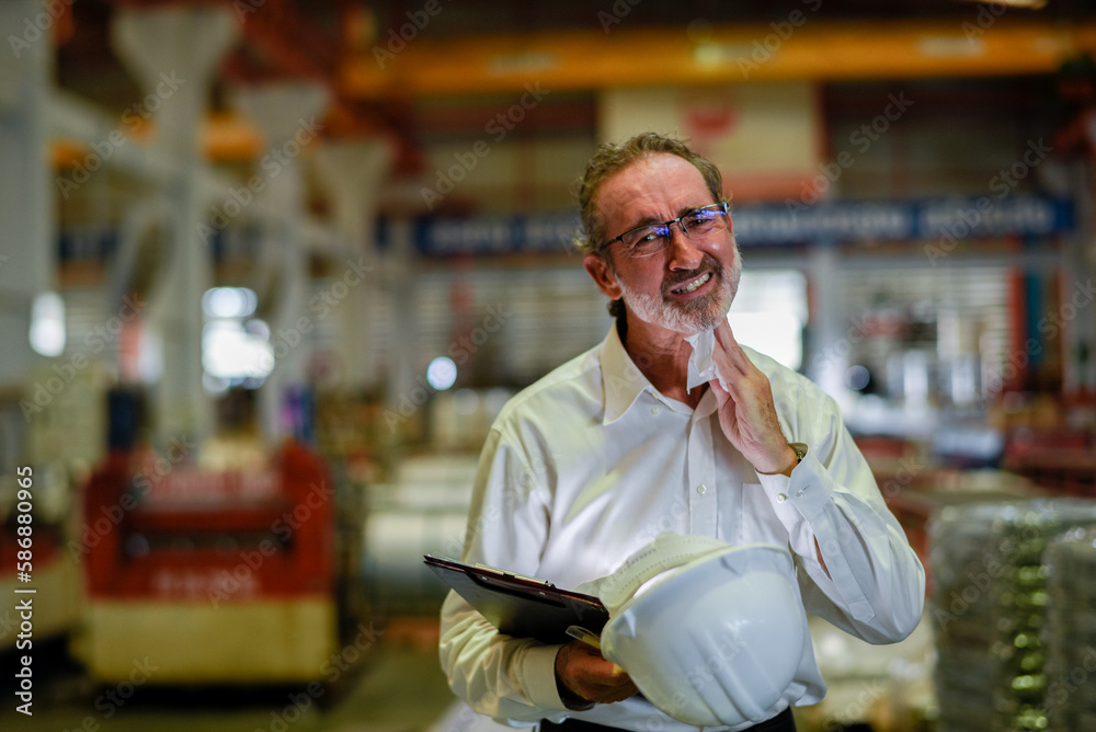 boss manager engineer with helmet tired in construction factory heavy industry . tired senior ...