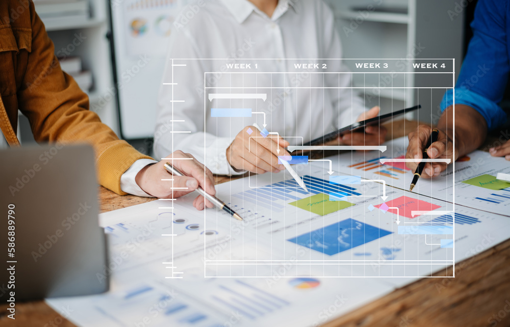 Project manager working and update tasks with milestones progress ...