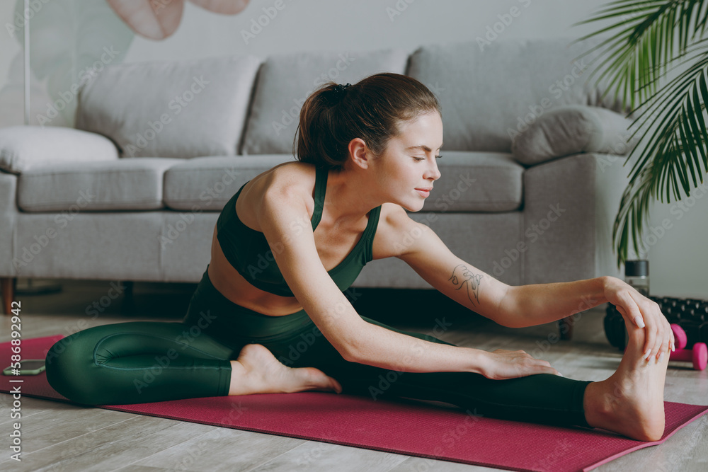 Full body young strong athletic fitness trainer instructor woman wear ...