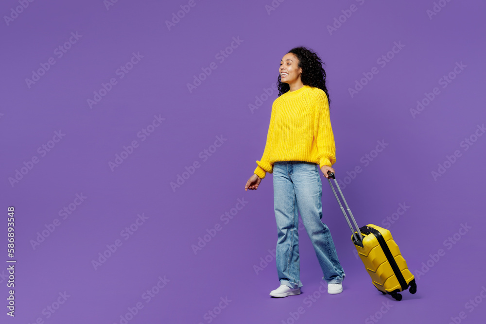 Side view traveler woman wear casual clothes hold suitcase walk go ...