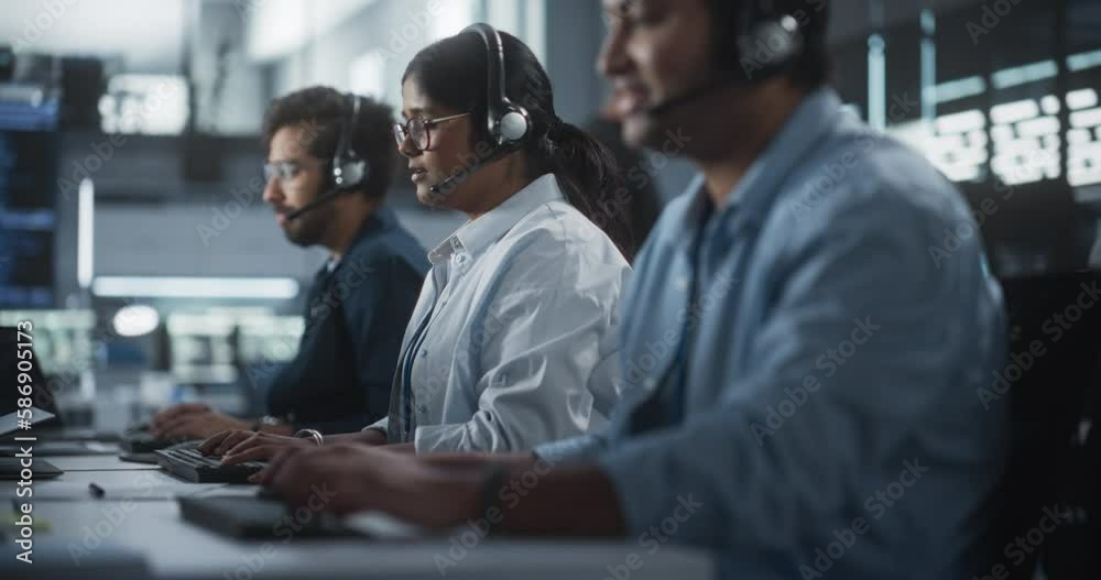 Indian Customer Support Team Using Computers and Talking with Clients ...
