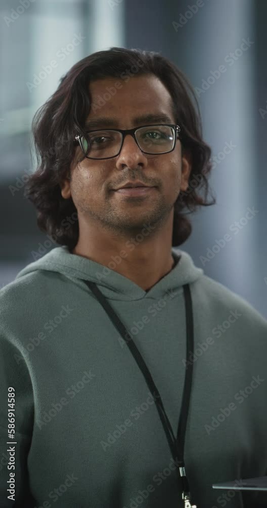 Vertical Screen: Young Indian Software Engineer Using Laptop Computer ...