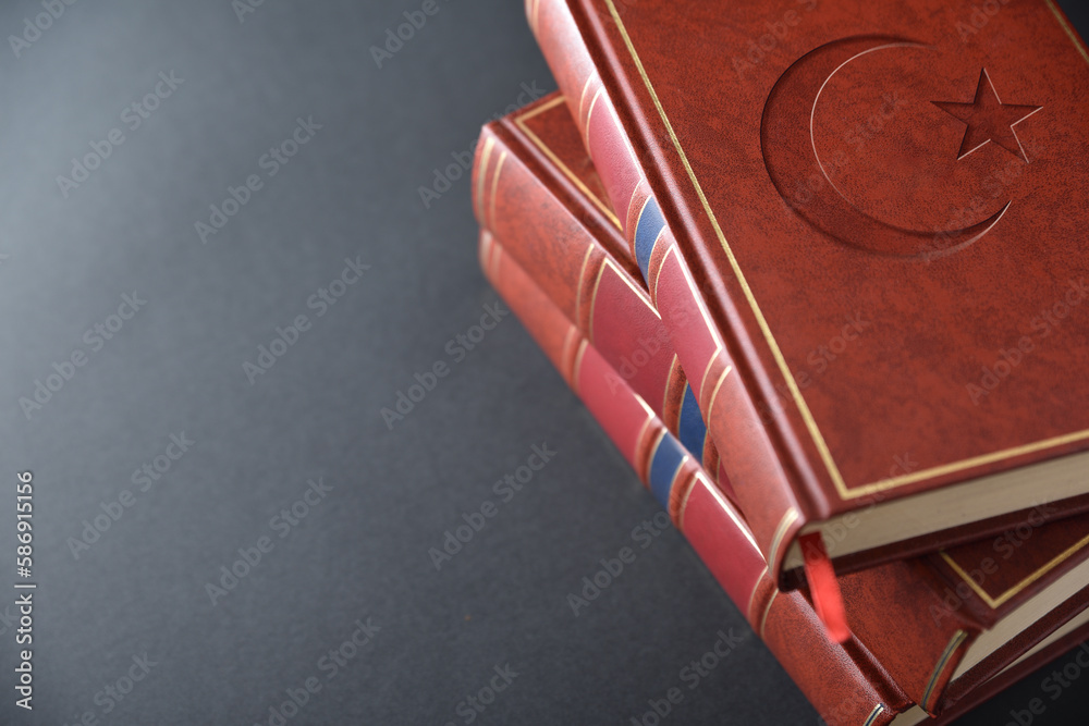 Stack of books with engraved symbol islamic elevated view Stock Photo ...