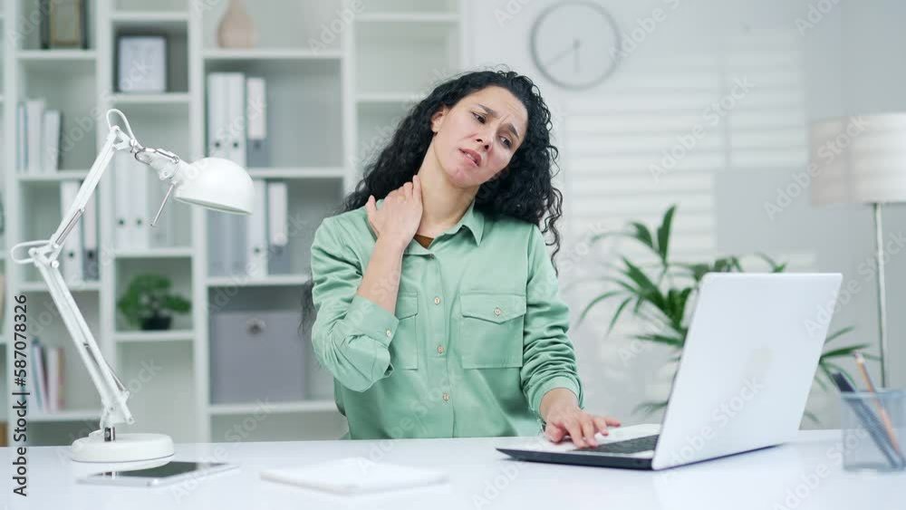 Overworked tired young employee businesswoman suffers with severe pain ...