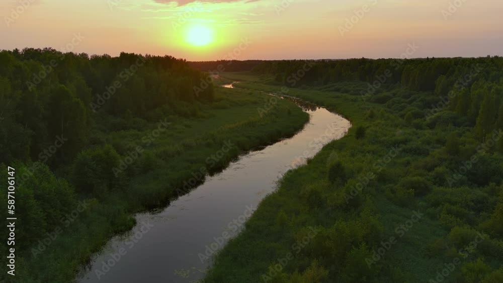 Idyllic drone shot of the Vohandu river in Estonia. Amazing sunset in ...
