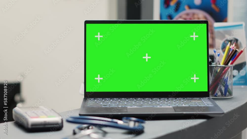 Empty front desk with green screen on pc, hospital reception counter ...