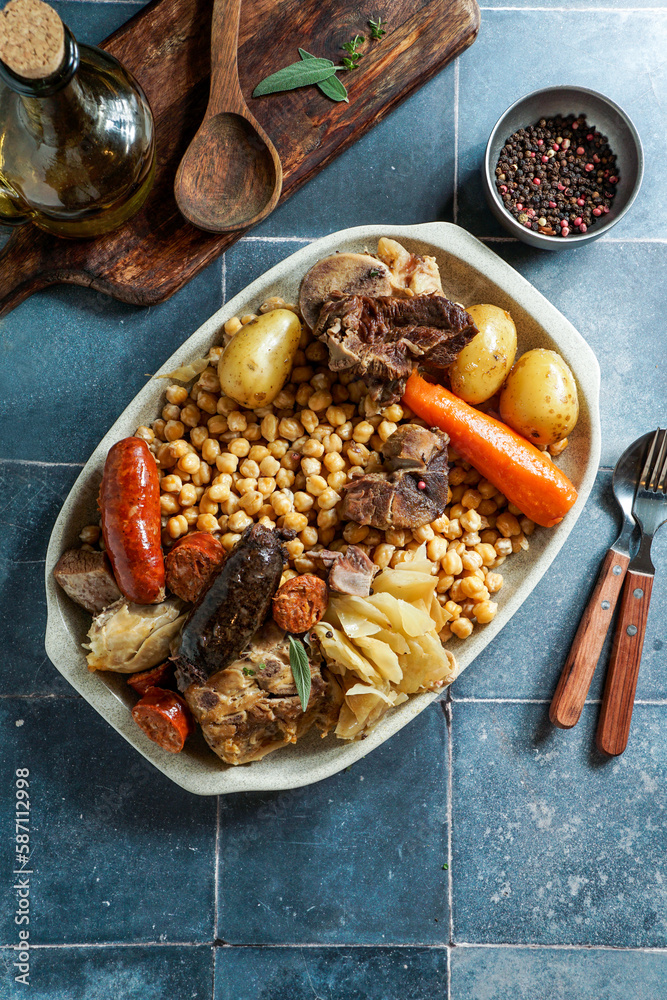 Cocido Madrileño, a traditional Spanish meal, chickpea-based stew from ...