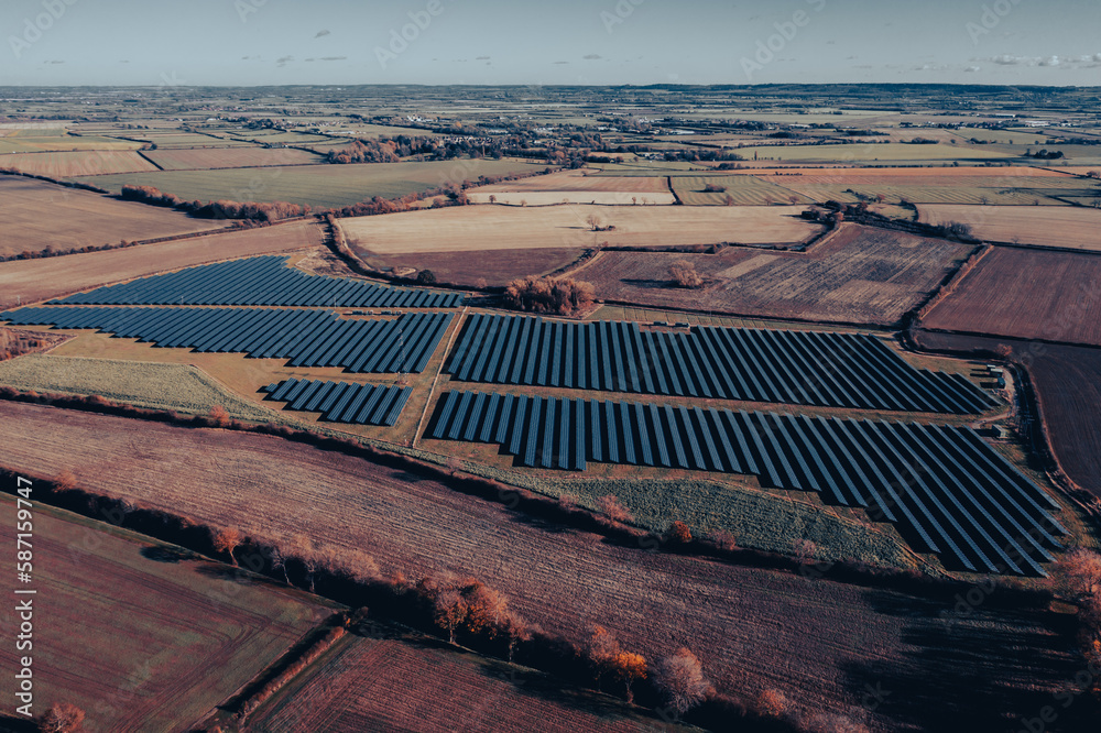 Power plant using renewable solar energy with sun. Aerial looking over ...