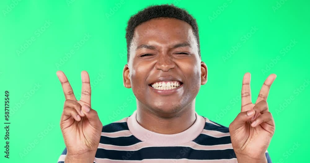 Black man, peace sign and face by green screen for smile, happiness or ...
