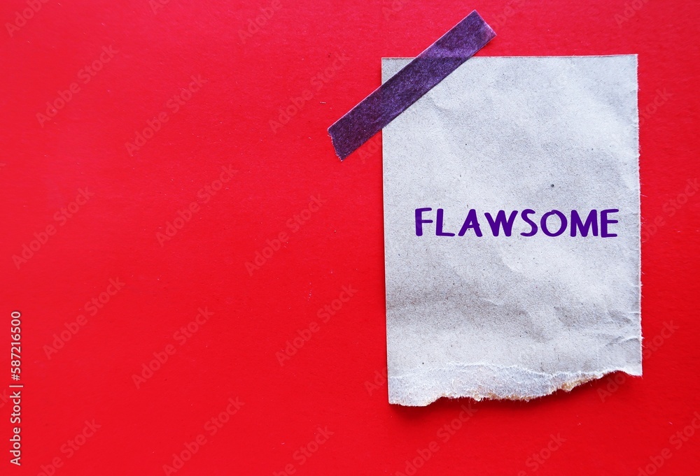 Craft paper stick on red copy space background with handwritten text ...