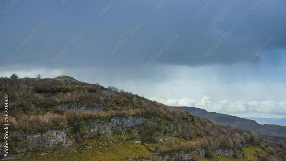 Timelapse of rural nature hill side landscape with prehistoric stone ...