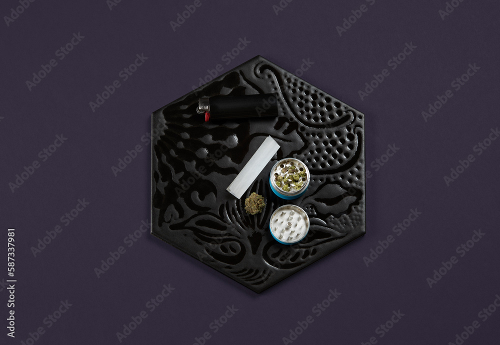 Decorative black tile with Marijuana Cannabis and accessories. Rolling ...
