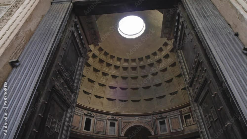 Entrance door to pantheon view of pantheon ceiling spinning sun rays ...