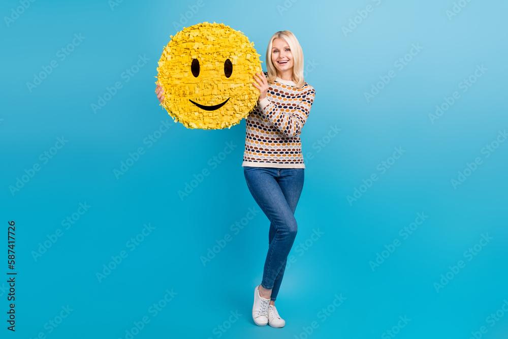 Full size photo of positive aged lady hands hold big smiley emoji ...
