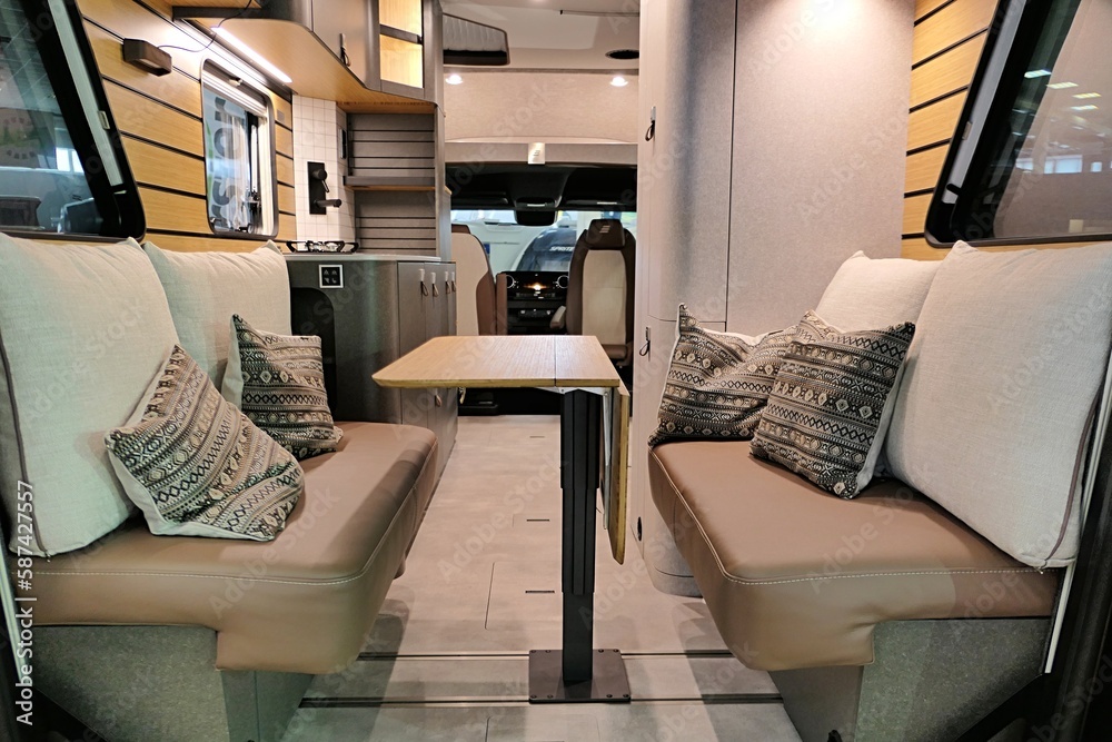 Side seats with pillows and portable dining table in modern german ...