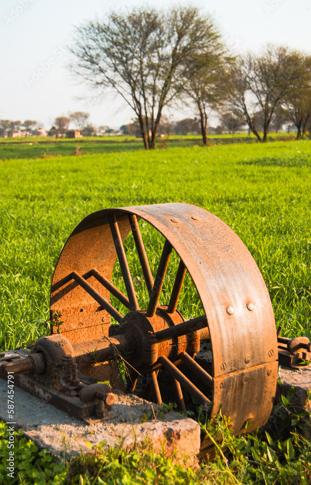 Old rusted water pump wheel in agriculture field its look so beautiful ...