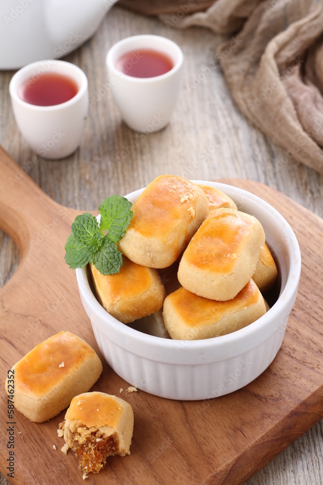 Nastar is a pastry made of wheat flour, butter, and egg dough filled ...