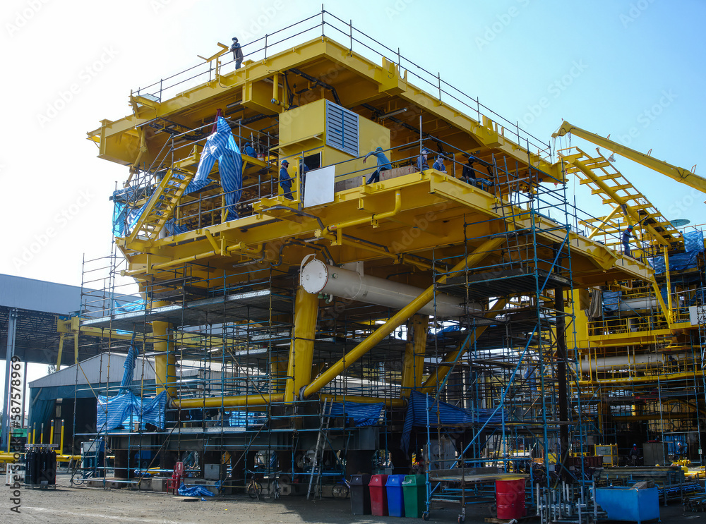 Oil rig platform construction site and worker concept. Stock Photo ...