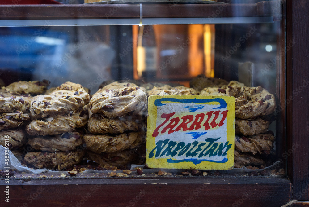 Naples, Italy. Inside a small stall with a showcase, at Via Pignasecca ...