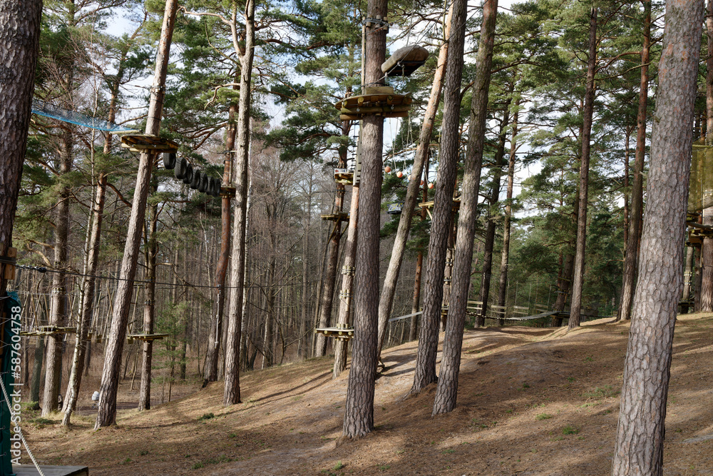 Foto de Amusement park in the forest with an obstacle course. Fragment ...