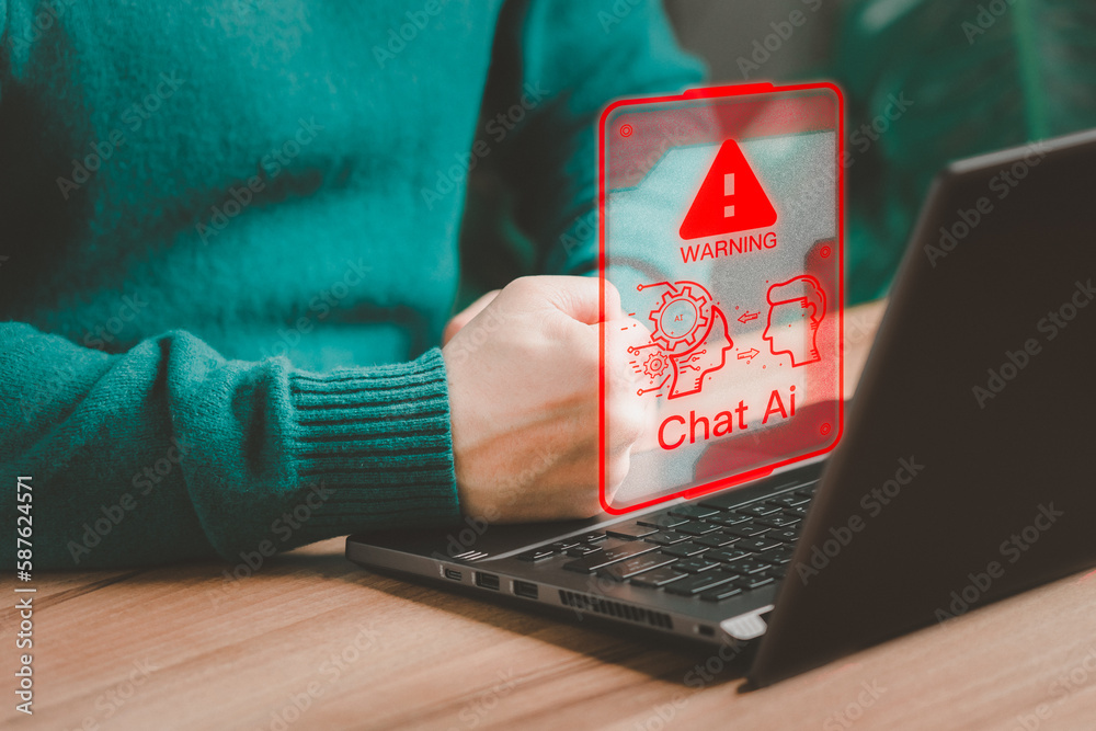 Young man using laptop chatting with a smart AI using an artificial ...