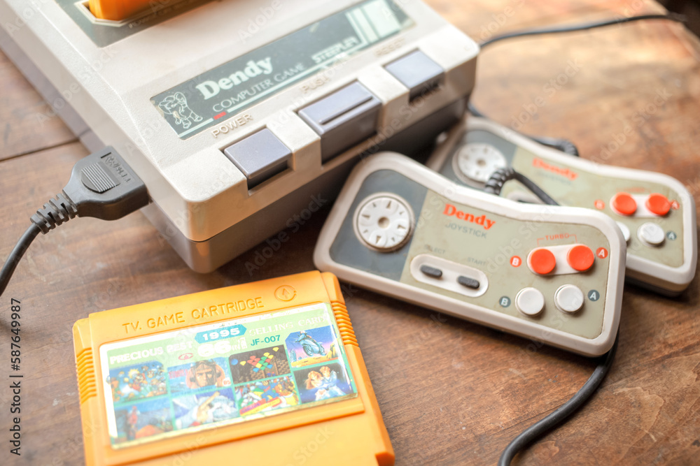 Vintage dandy set-top box. A game console from the 90s. An eight-bit ...